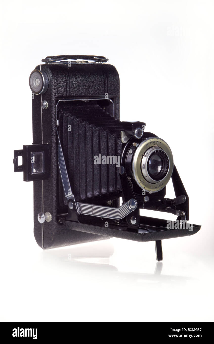 Vintage folder bellows film camera isolated on white background Stock ...