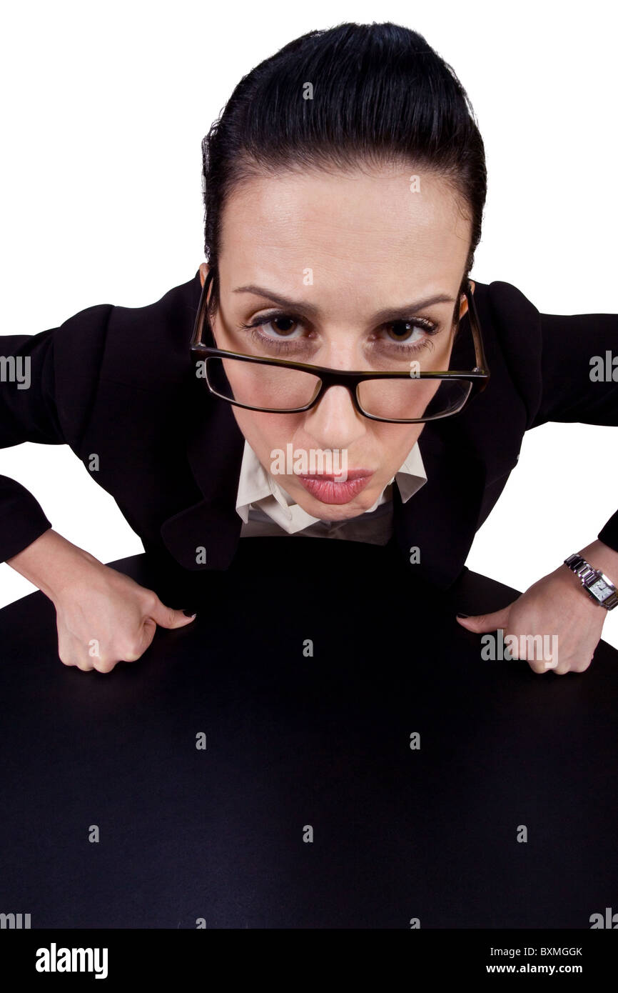 Female leaning in with serious look Stock Photo - Alamy