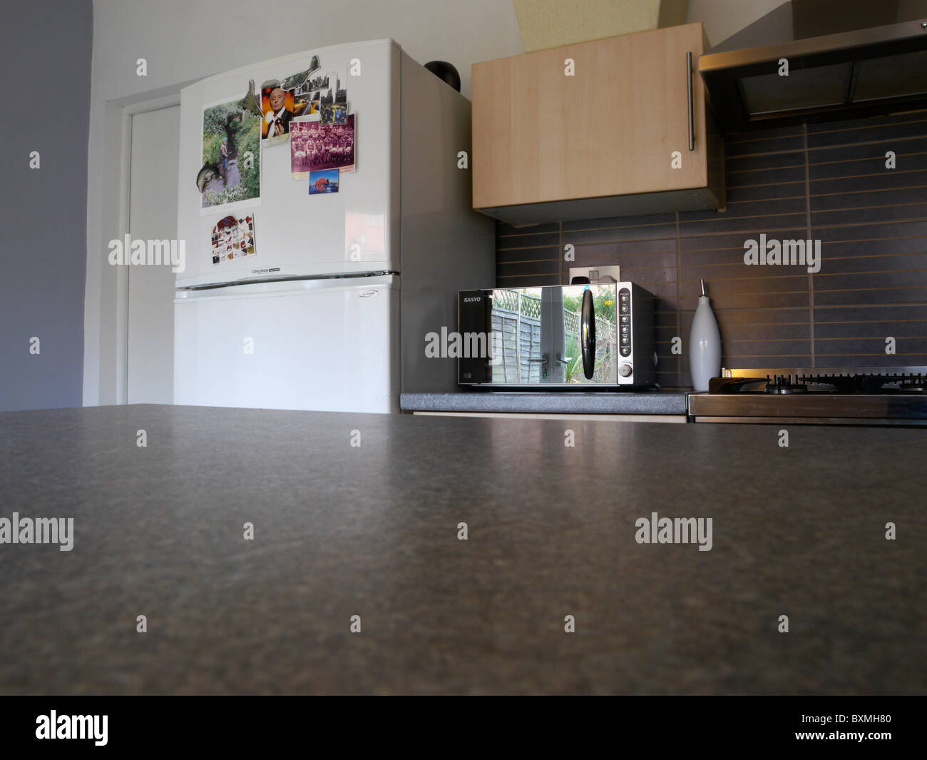 kitchen with appliances and table tops Stock Photo - Alamy