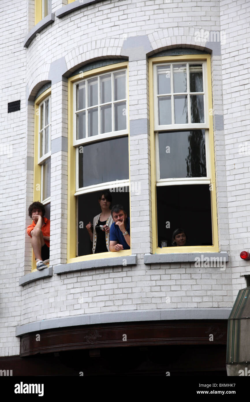 People sitting in window sills hi-res stock photography and images - Alamy