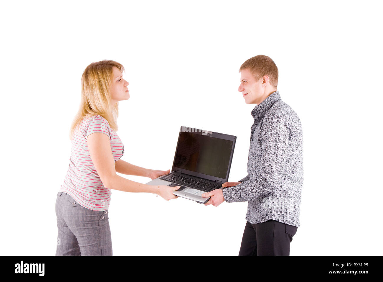 on a white background a man and a woman fighting for laptop Stock Photo ...