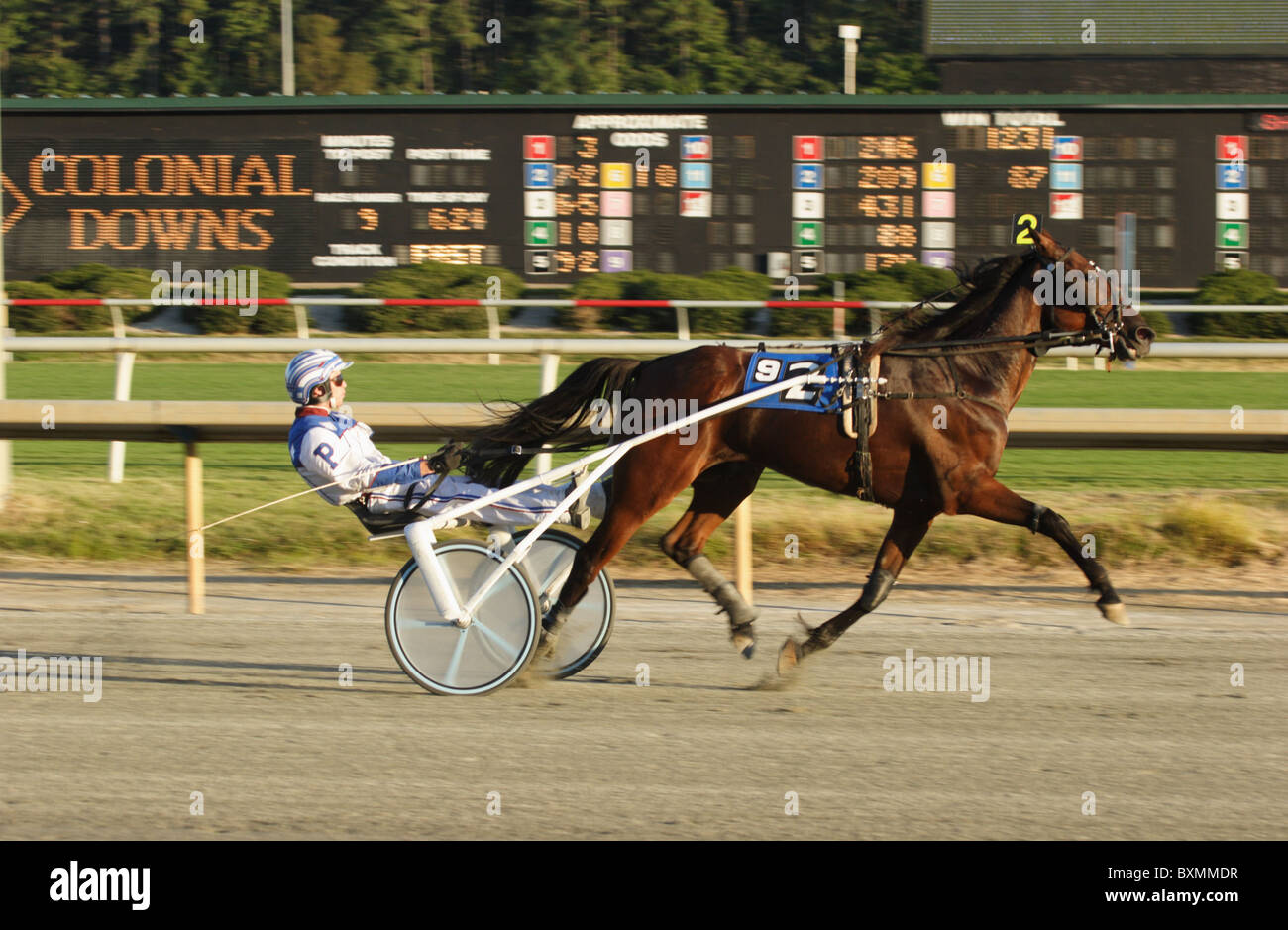 Harness racing at Colonial Downs racetrack in New Kent County, Virginia, USA. 2010 Stock Photo ...