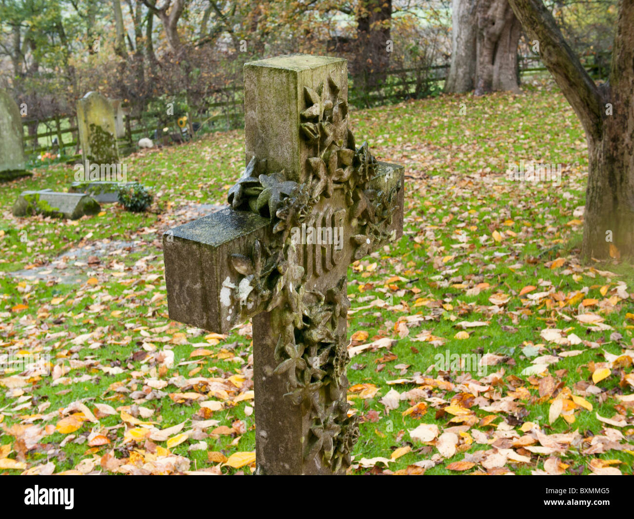 gravestones lit by the sun in a country cemetery Stock Photo - Alamy