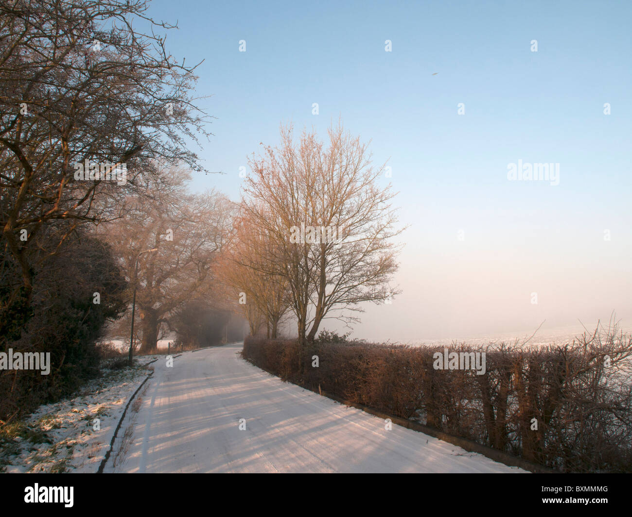A winter sunset in the countryside Stock Photo - Alamy
