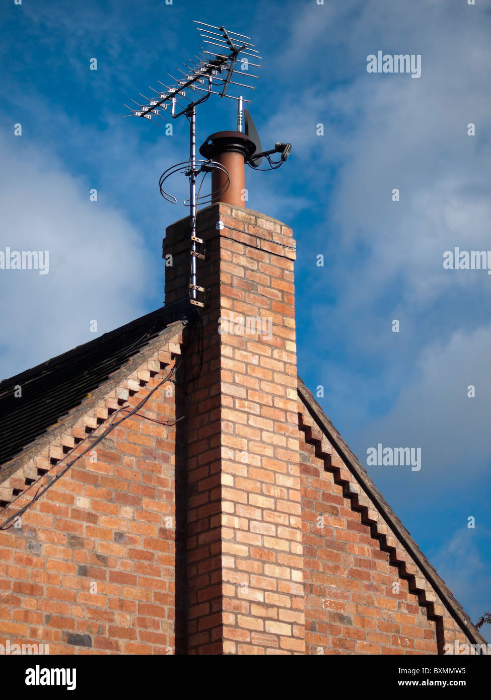 A satellite digital television arial on a roof Stock Photo - Alamy