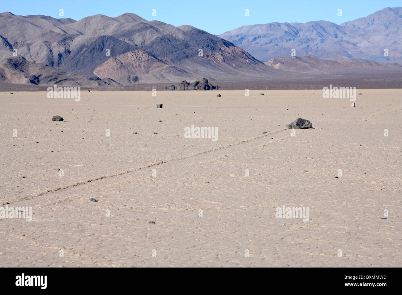 Trail created by a moving rock on the Racetrack Playa in Death Valley ...