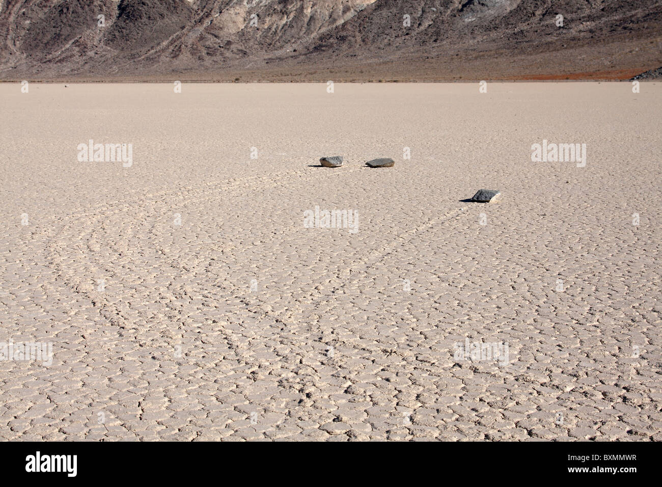 Trails created by moving rocks on the Racetrack Playa in Death Valley ...