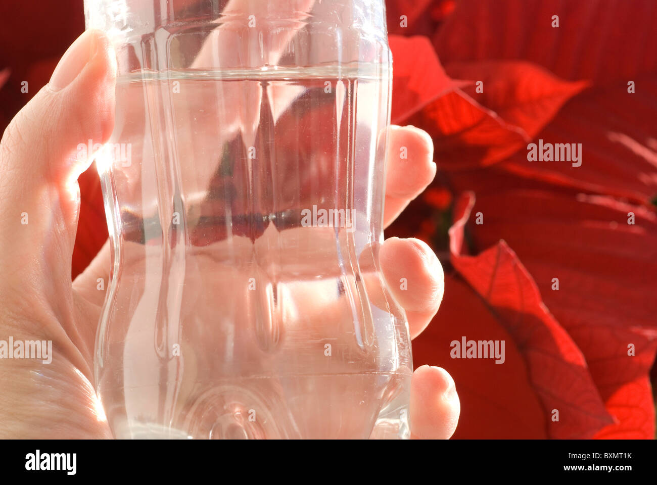 Hand and bottle hi-res stock photography and images - Alamy