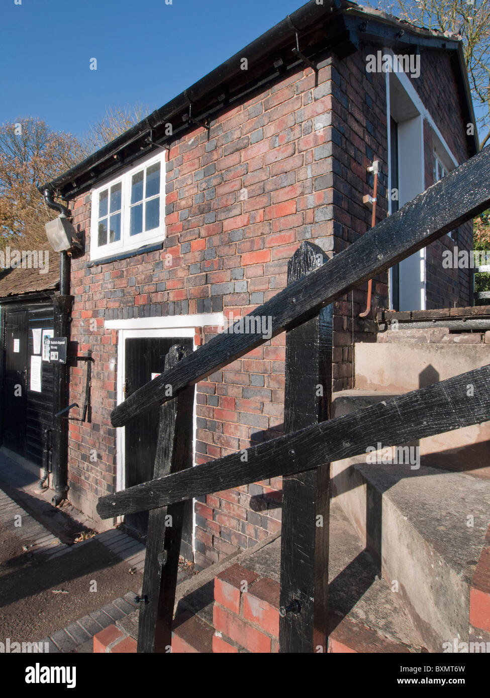 A very small house with storeroom attached Stock Photo - Alamy