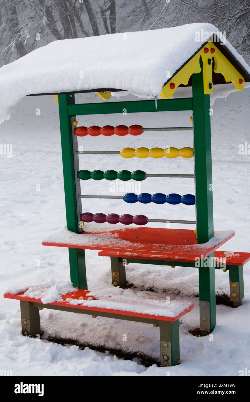 A child's counting frame in the snow in Germia Park, a public area ...