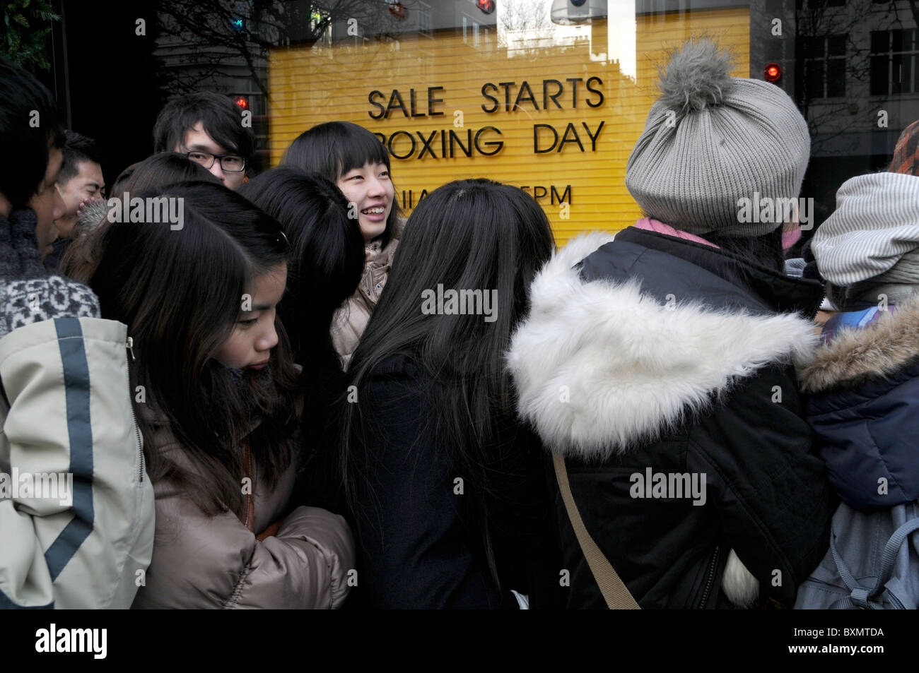 Queue shoppers outside hi-res stock photography and images - Alamy