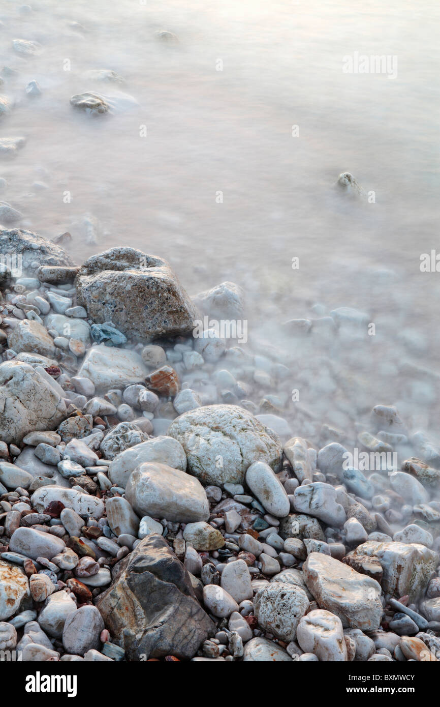 Pebbles on Beach Stock Photo - Alamy