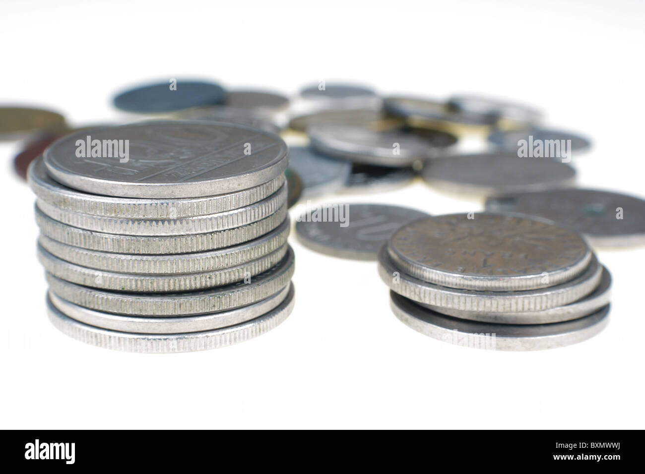 Stack of coins money isolated on white background Stock Photo - Alamy