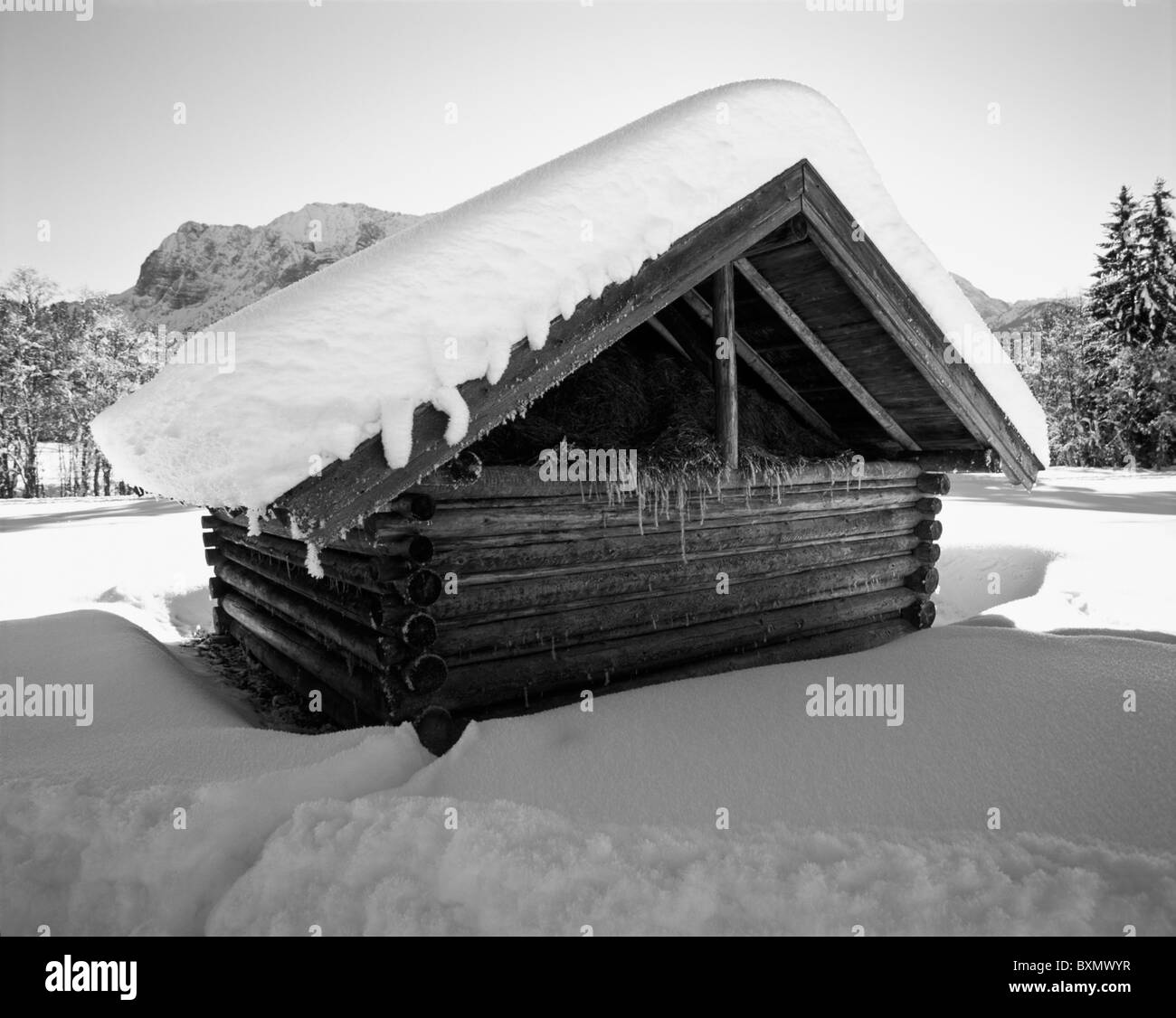Snow covered roof in winter Black and White Stock Photos & Images - Alamy