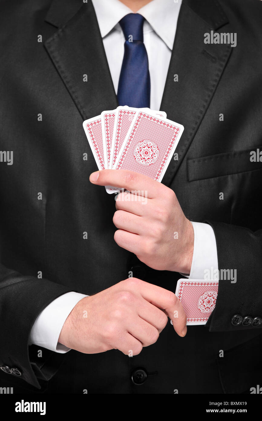 Person holding four cards in his hand Stock Photo - Alamy