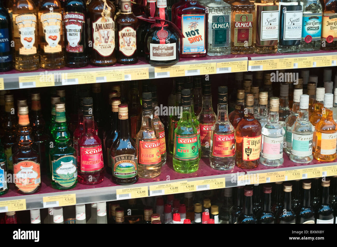 Bottles of vodka and other alcohol drinks in shop. Soft focus Stock ...