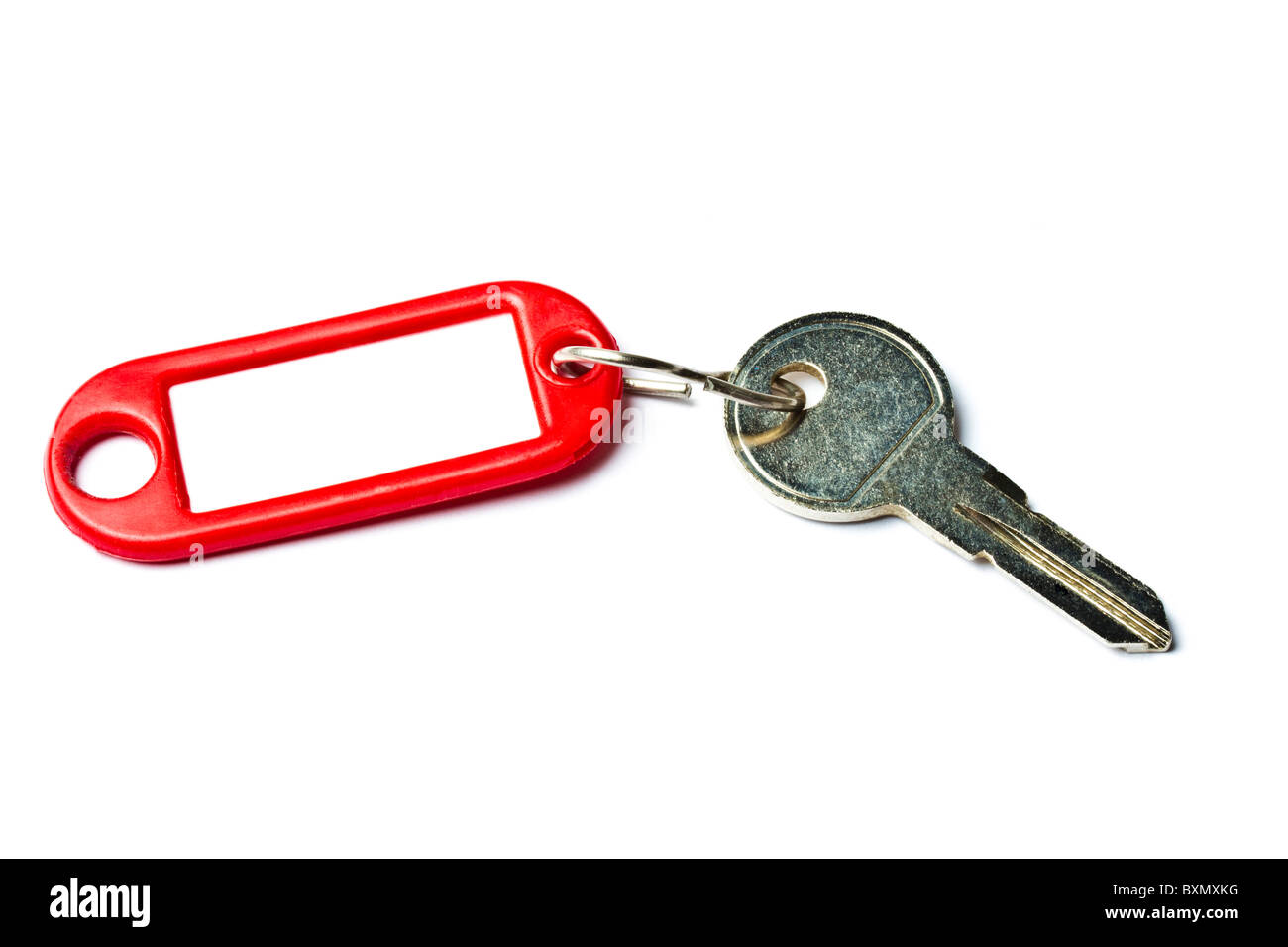 Blank tag and a key isolated on white background Stock Photo - Alamy