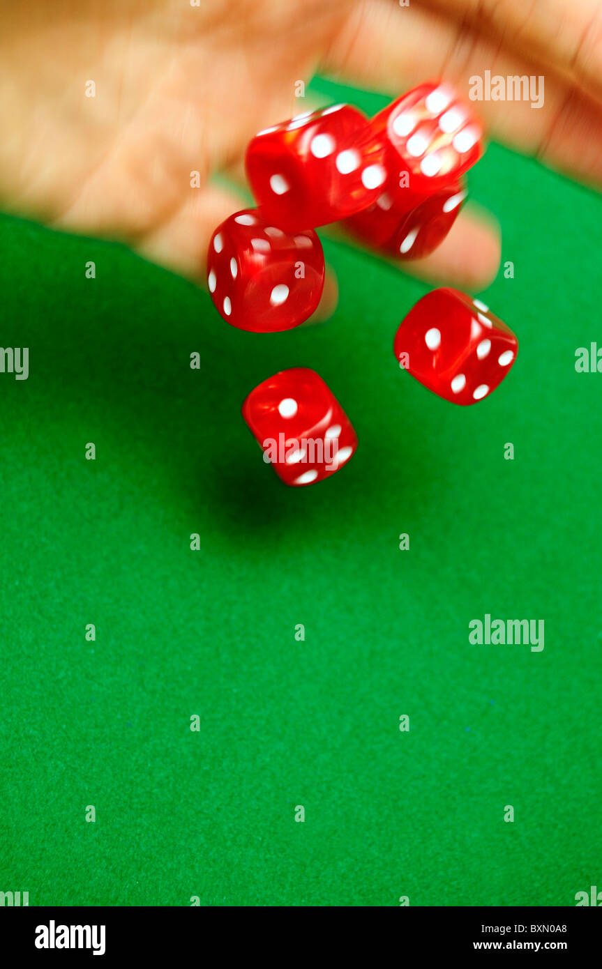 Hand with dice hi-res stock photography and images - Alamy