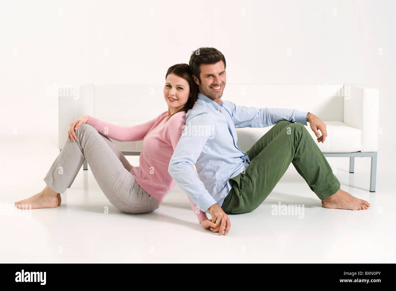 couple back to back Stock Photo - Alamy