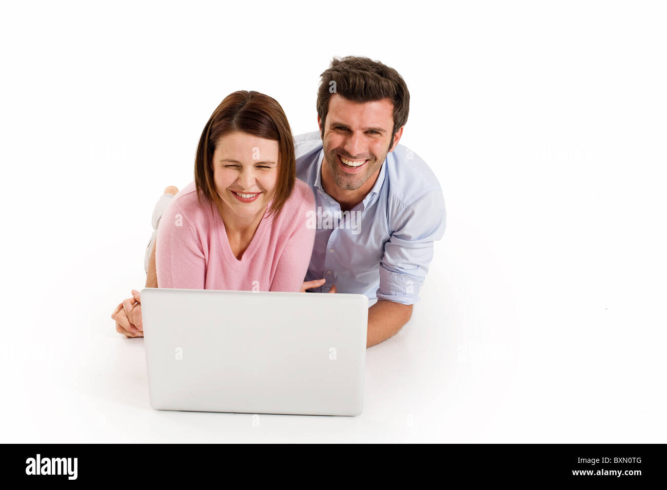 couple with laptop Stock Photo - Alamy