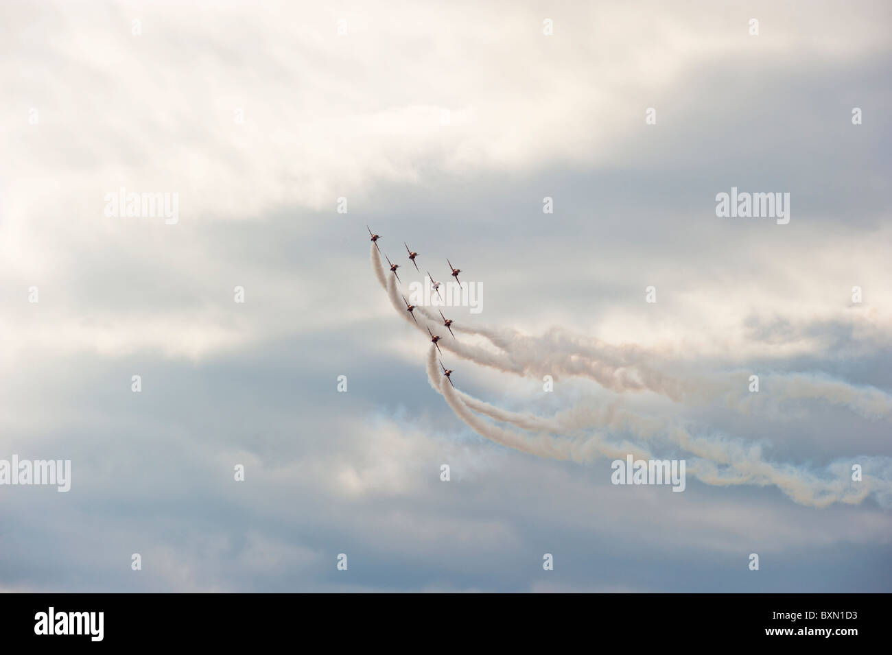 Red Arrows air display at the 2010 Farnborough Air Show Stock Photo - Alamy