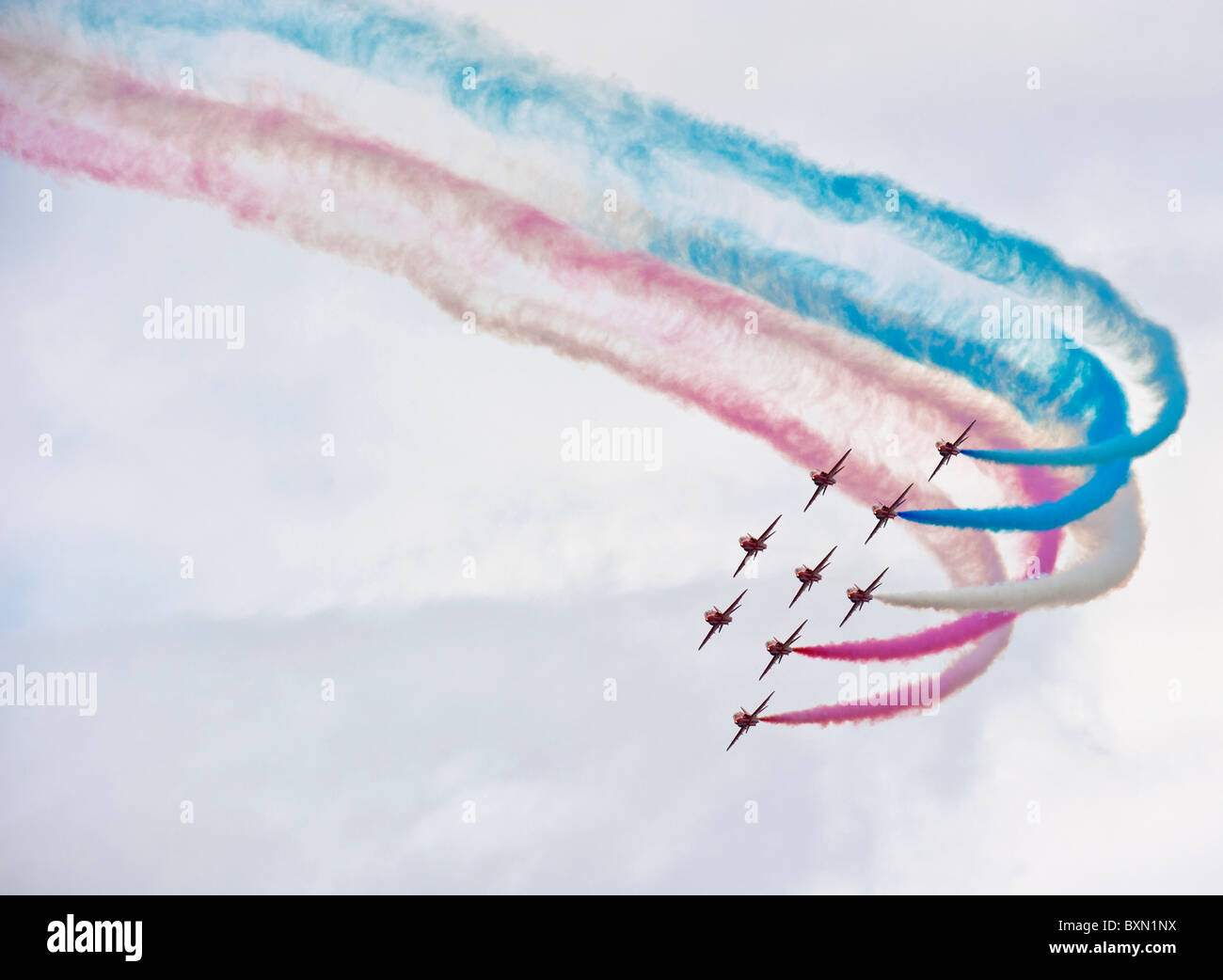 Red Arrows air display at the 2010 Farnborough Air Show Stock Photo - Alamy