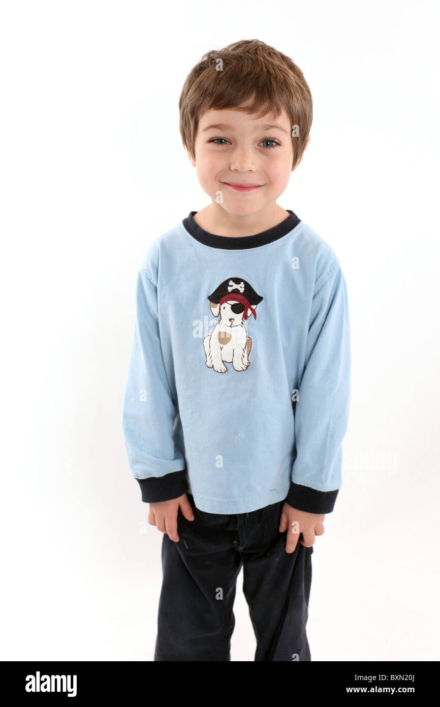 Smiling 4 year old boy in studio on white Stock Photo - Alamy