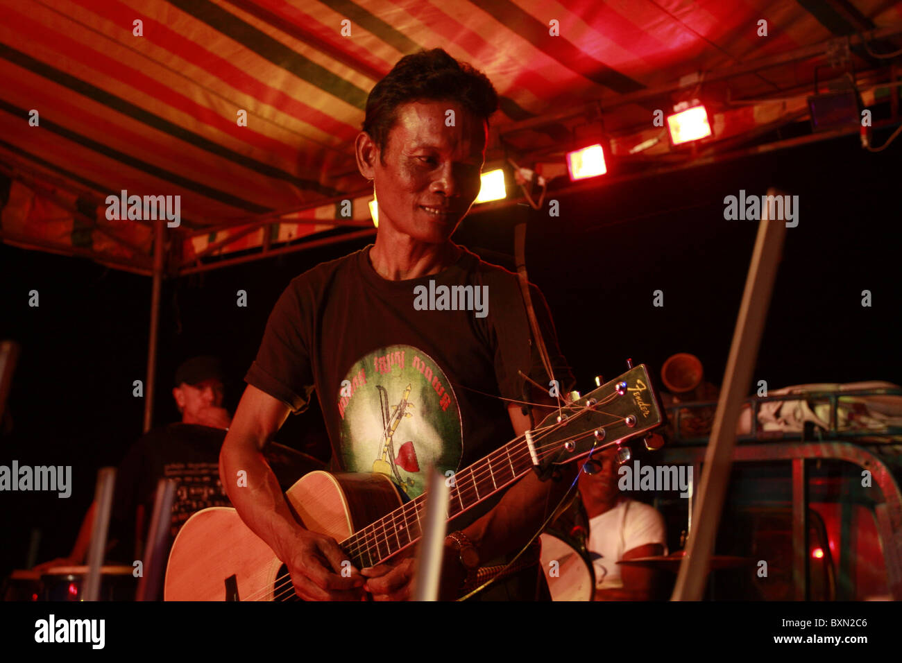 A Khmer guitar player performs in Kampot, Cambodia Stock Photo - Alamy