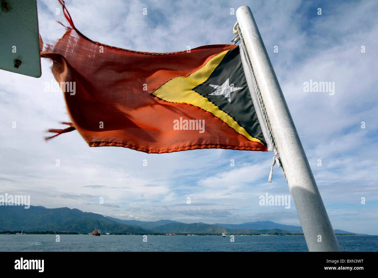 Flag of Timor Leste (East Timor) on the rear of a Ferry boat from Dili ...