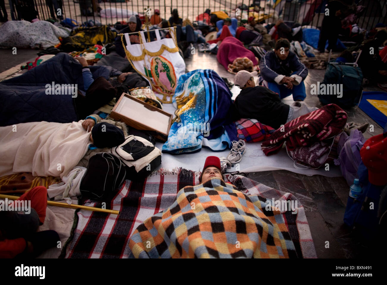Pilgrims sleep outside the Our Lady of Guadalupe Basilica in Mexico ...