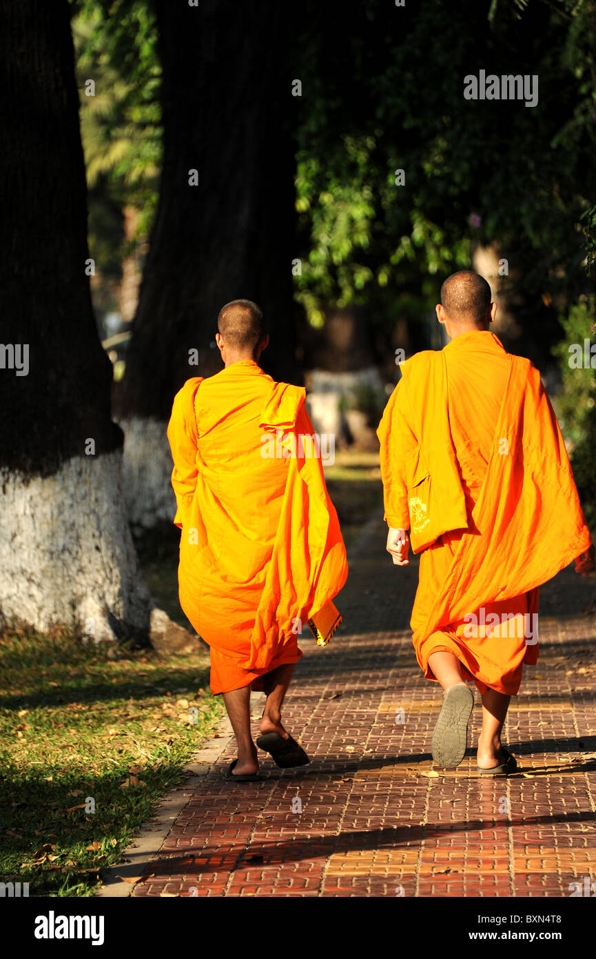 Two monks walk hi-res stock photography and images - Alamy