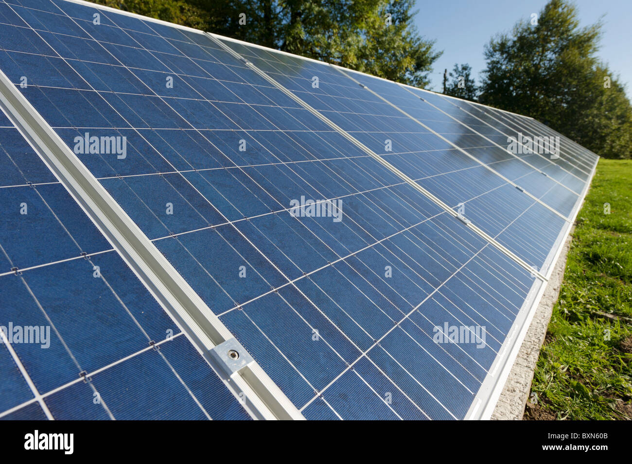 Photo-voltaic solar panels in an array in the UK Stock Photo - Alamy