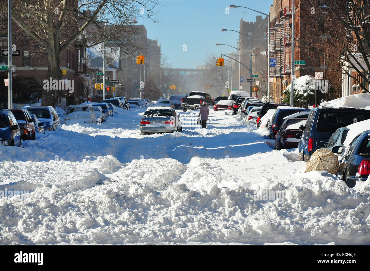 Street covered in snow in New York Stock Photo - Alamy