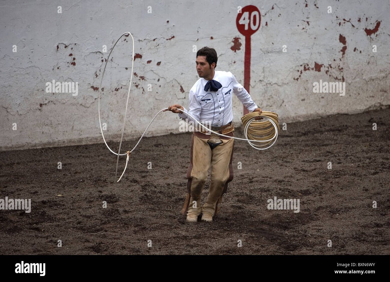 A Mexican charro practices with his lasso in Mexico City Stock Photo ...