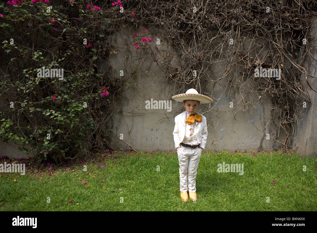 A boy dressed as a Mexican charro pose for a picture in Mexico City ...