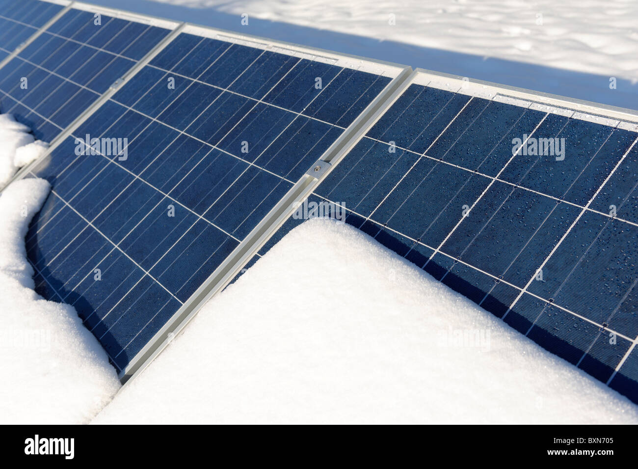 Photo-voltaic solar panel with snow Stock Photo - Alamy