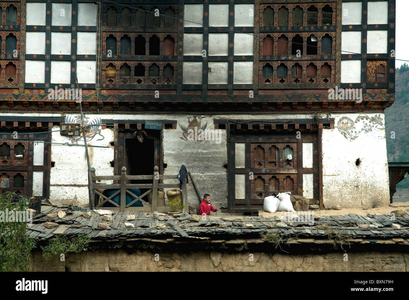 A traditional farmhouse and family home near Paro in Bhutan Stock Photo ...