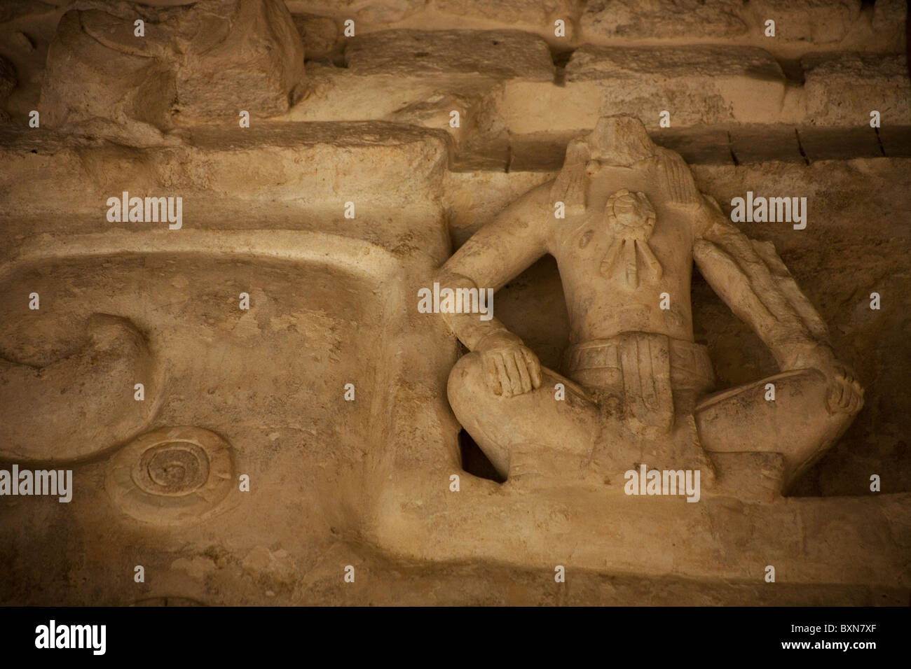 A sculpture representing a man sitting in the lotus position decorates ...