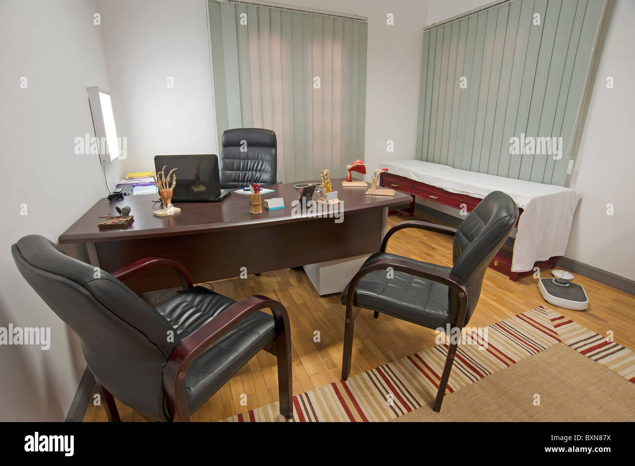 Consultation room in a doctors surgery with examination bed Stock Photo ...