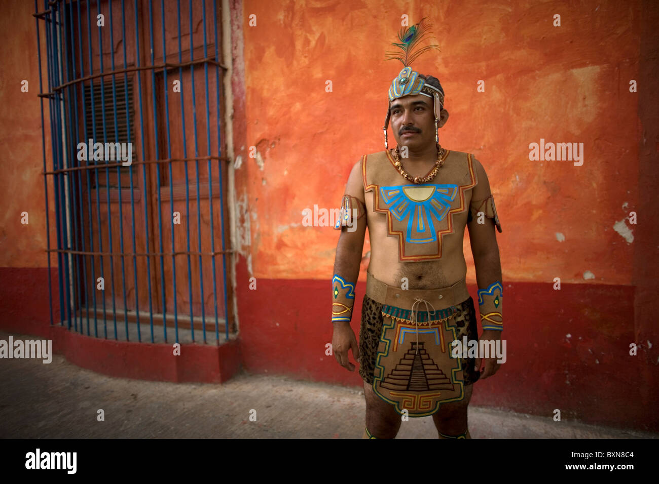 A Mayan ball player poses for a portrait in Chapab village in Yucatan ...