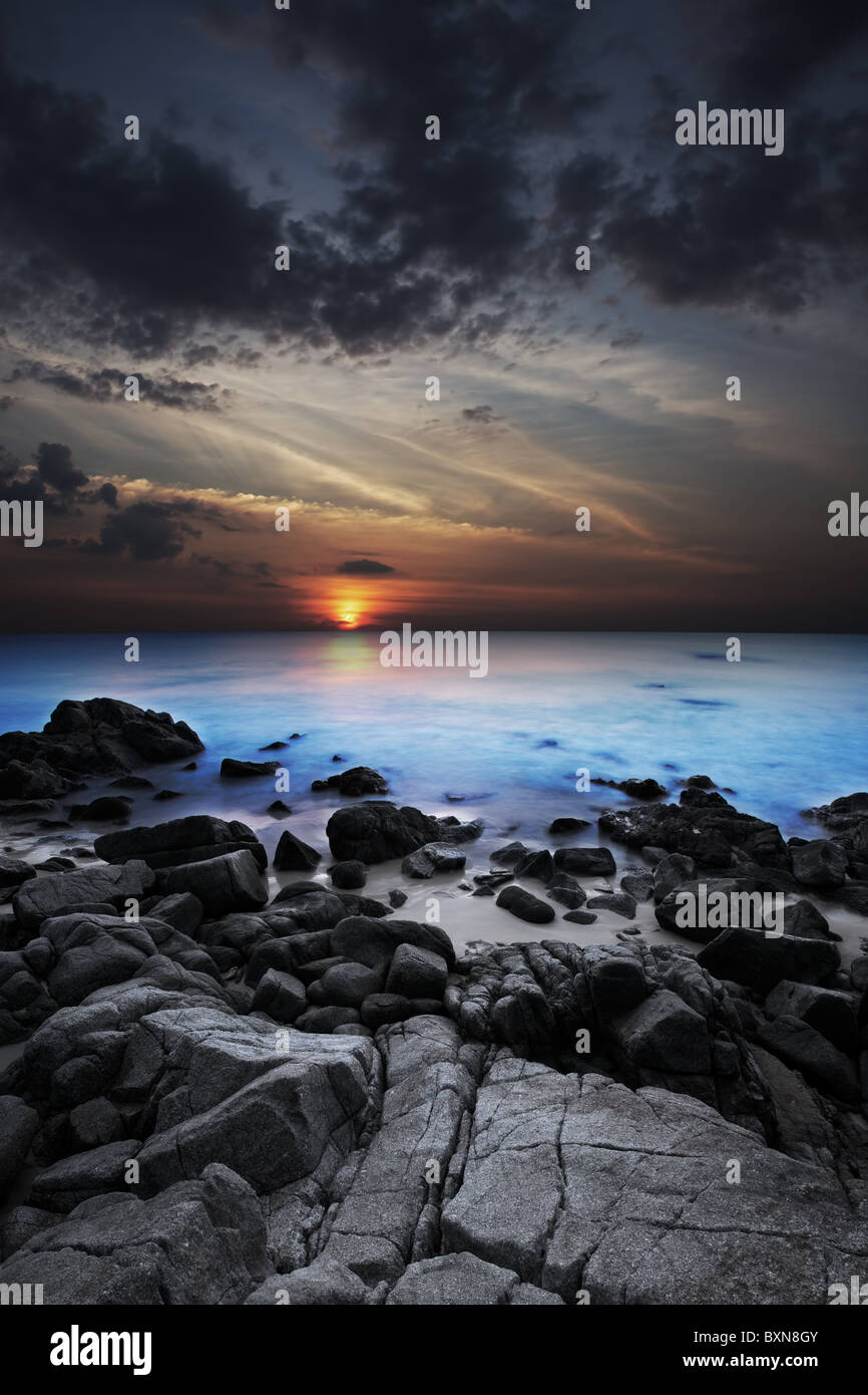 Beach at dusk Stock Photo - Alamy