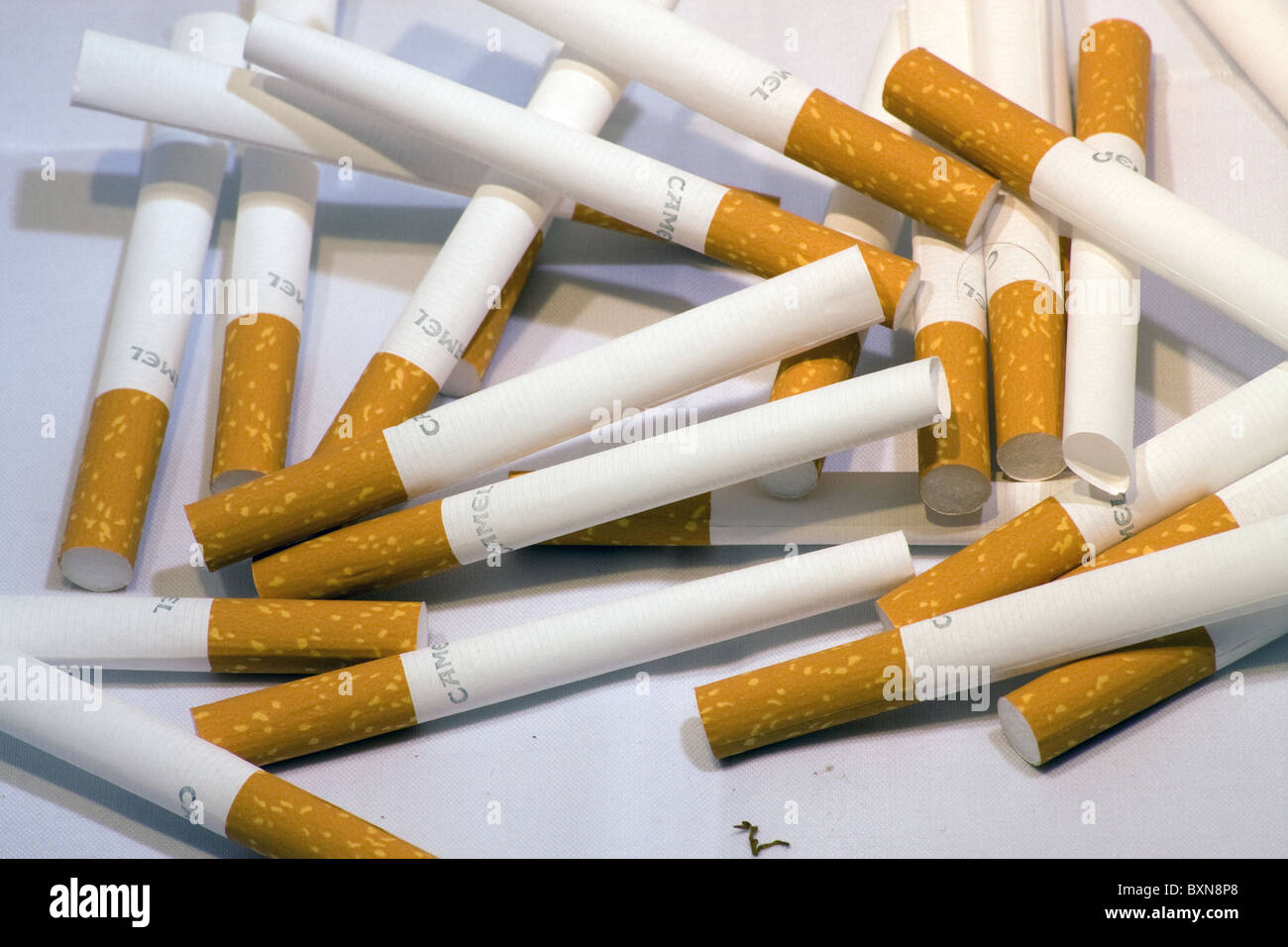pile of cigarette shells Stock Photo - Alamy