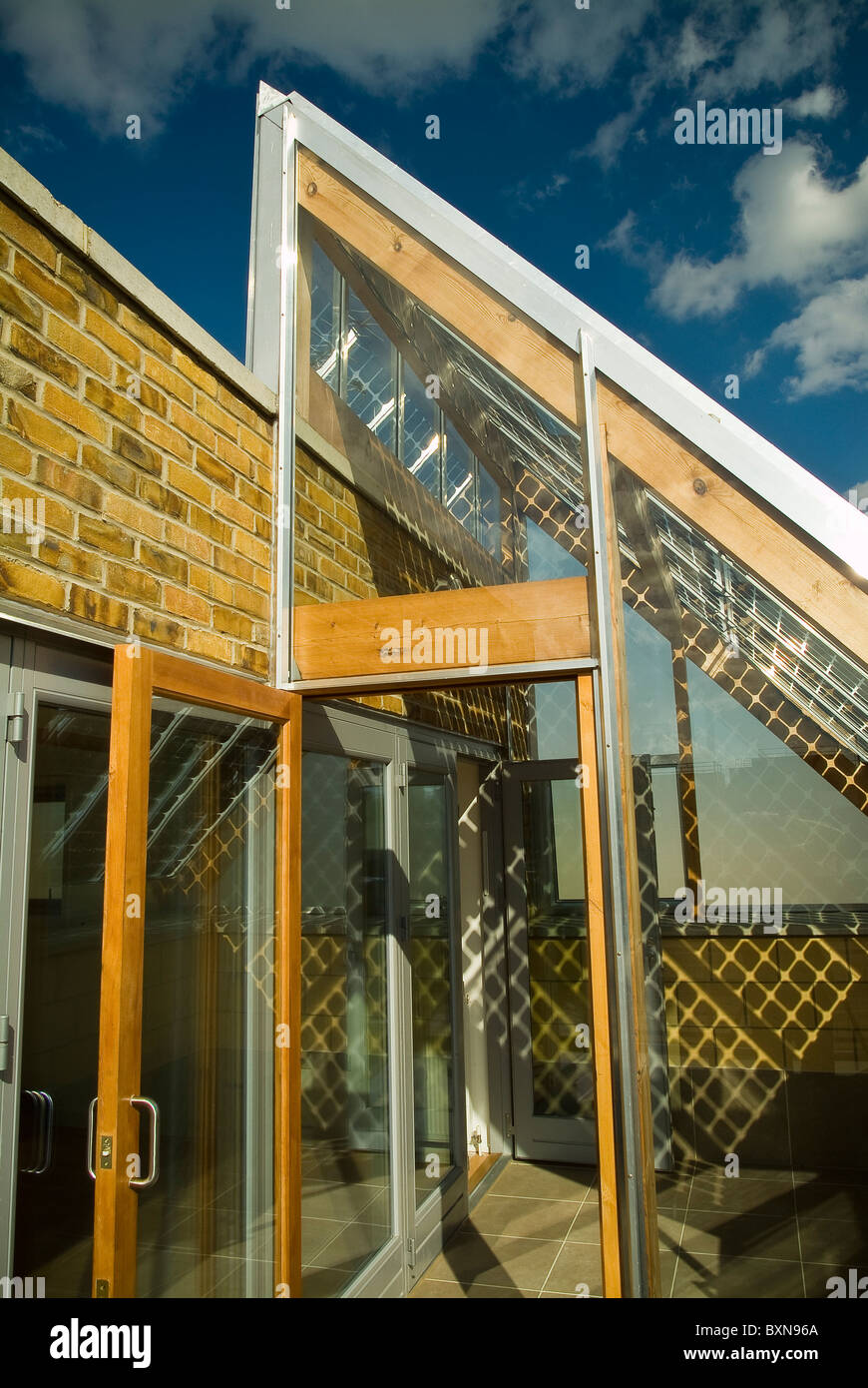 Solar panelled conservatory of BowZED eco-housing in Bow, East London ...