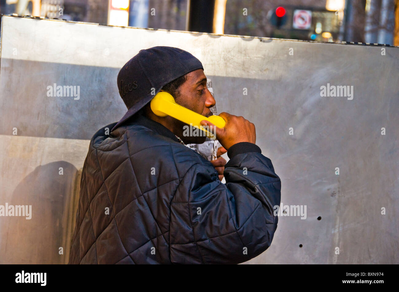 Black man using pay telephone in downtown San Francisco CA USA Stock ...