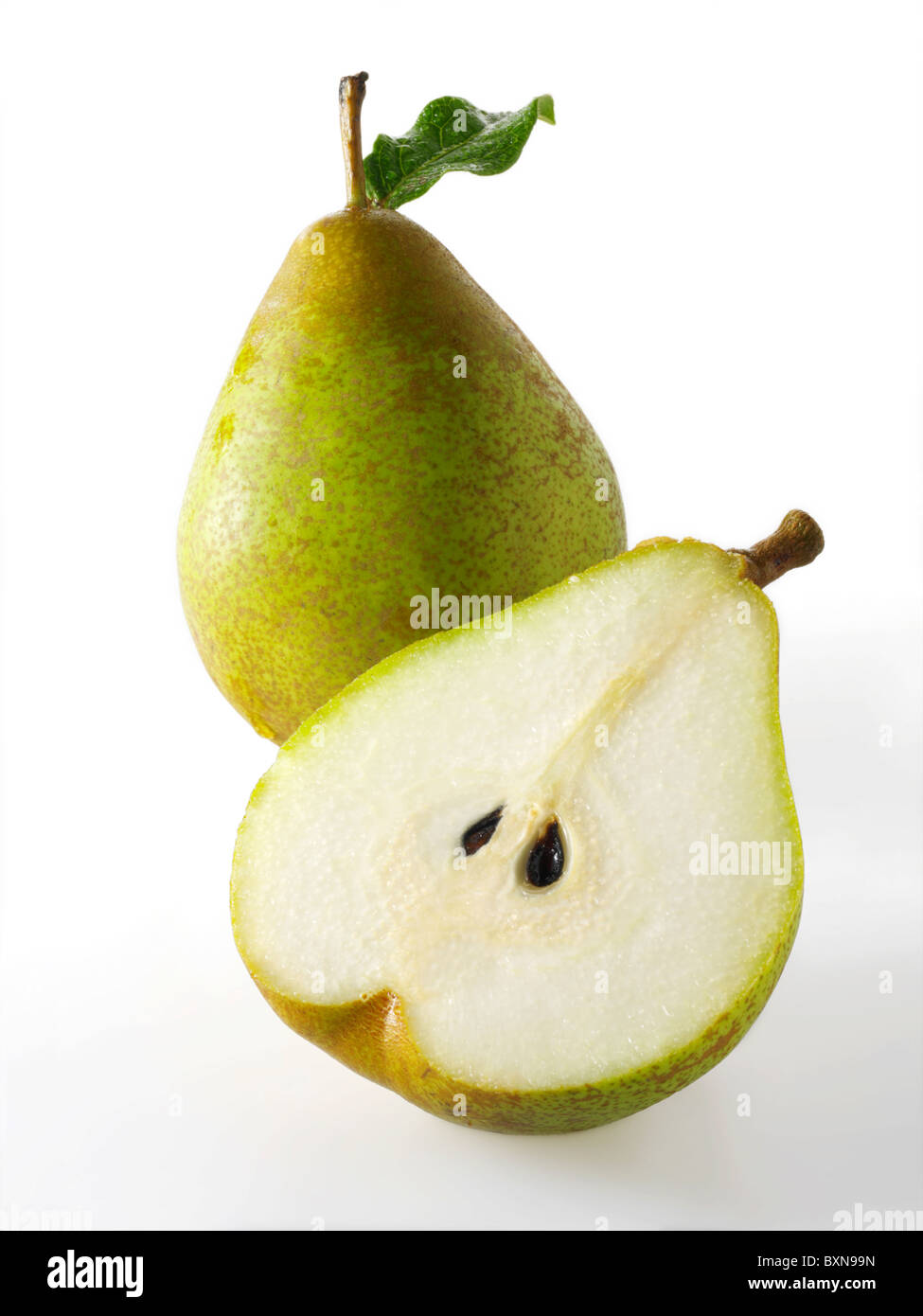 Fresh comice pears whole and cut Stock Photo - Alamy