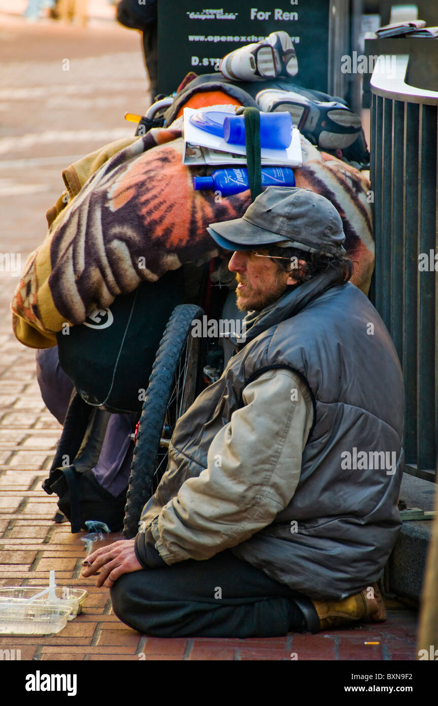 Homeless man sitting on city sidewalk in San Francisco CA USA ...