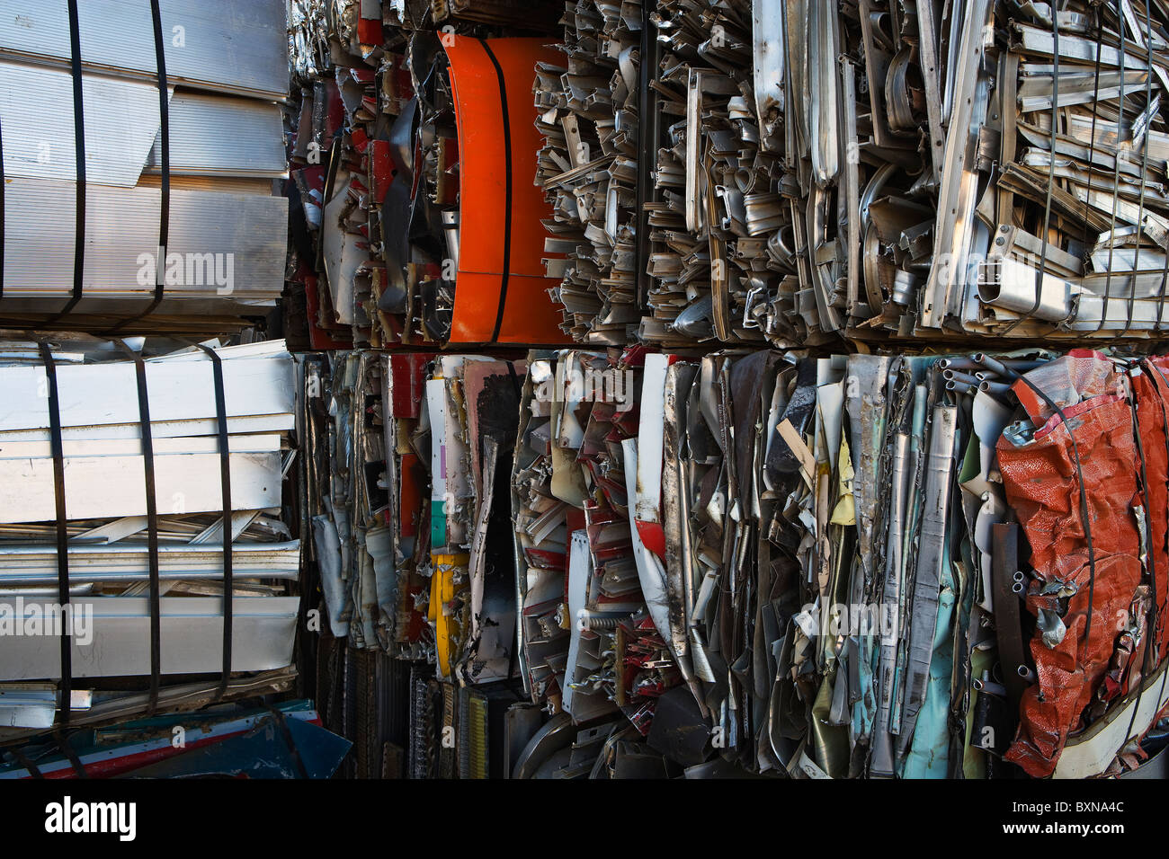 Colorful scrap aluminum is compressed and baled, ready for recycling ...