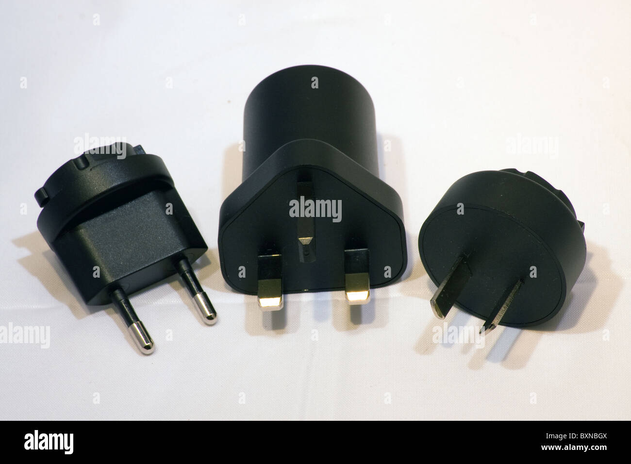 black electrical international mains adapter power Stock Photo - Alamy