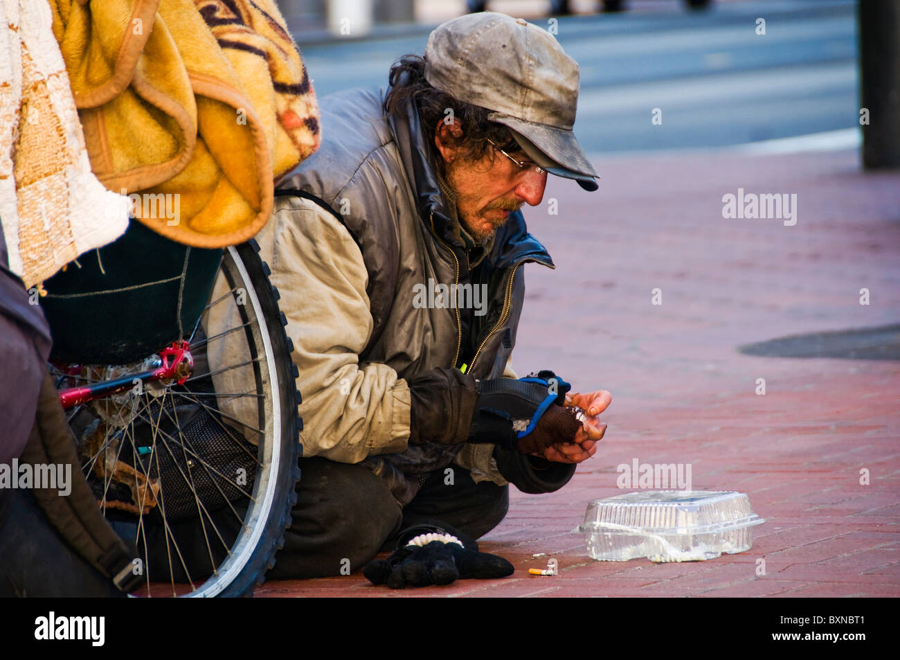 Homeless man sitting on city sidewalk in San Francisco CA USA ...