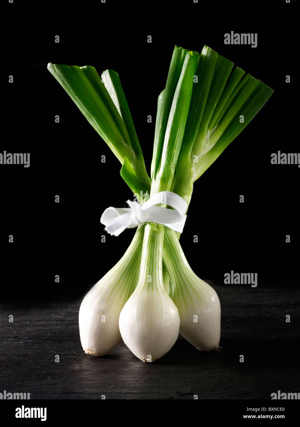 Bunch of fresh spring onions Stock Photo - Alamy